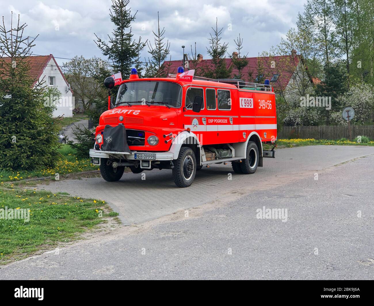 Fire truck on a city street Stock Photo - Alamy