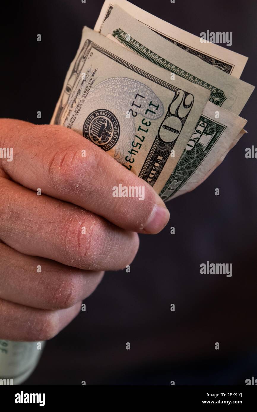 Hand Fist Full Of Money High Resolution Stock Photography and Images ...