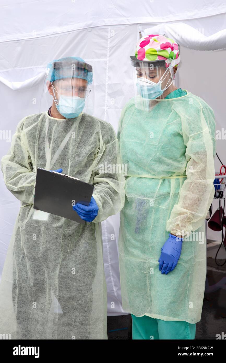 Healthcare providers test for CoVid19 and discuss antidote and testing ...