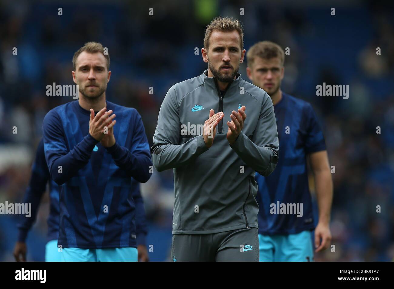 Smiling football fans Stock Photo - Alamy