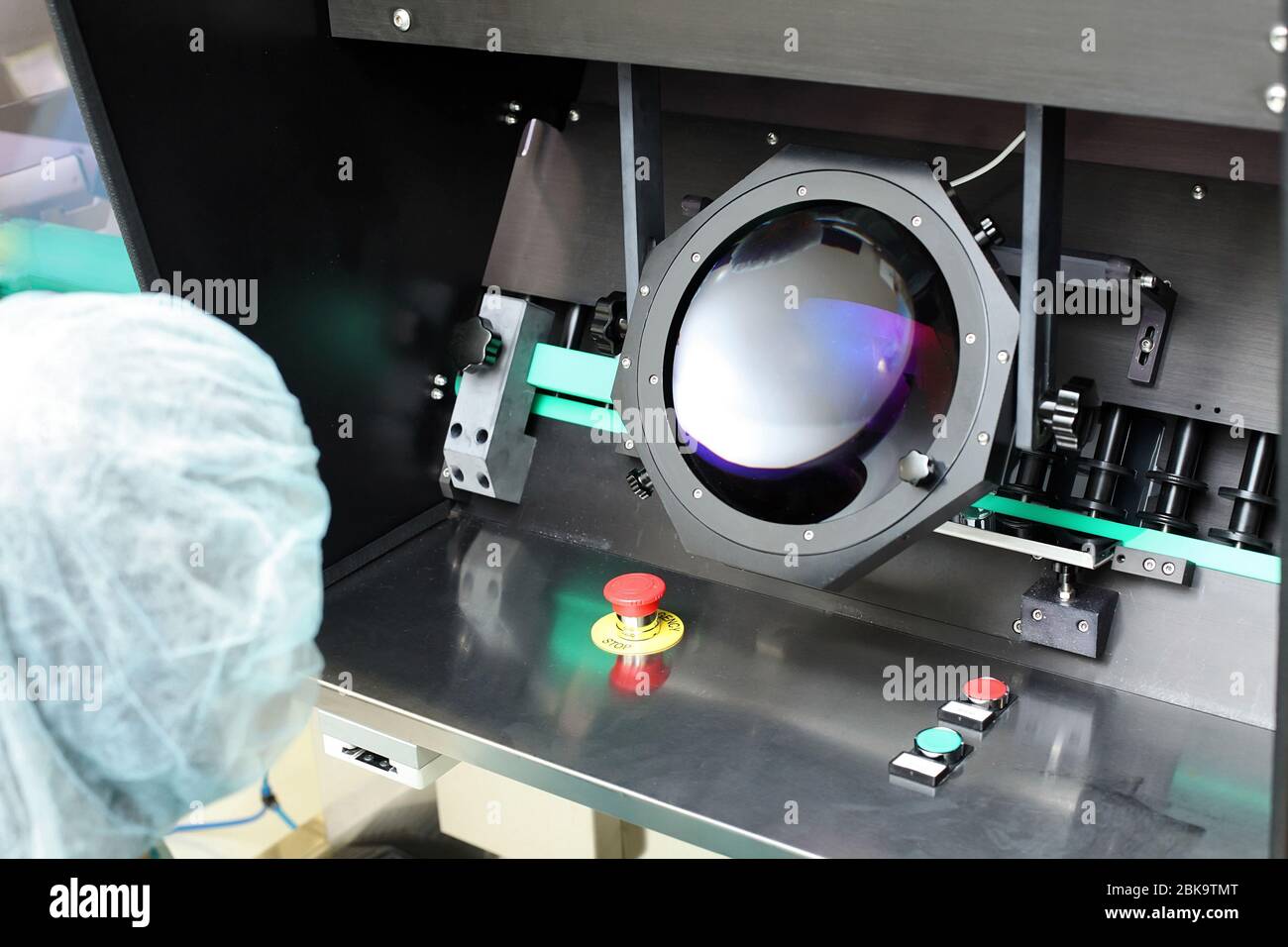 Quality Control vials for injection. Individual checks vial under a ...