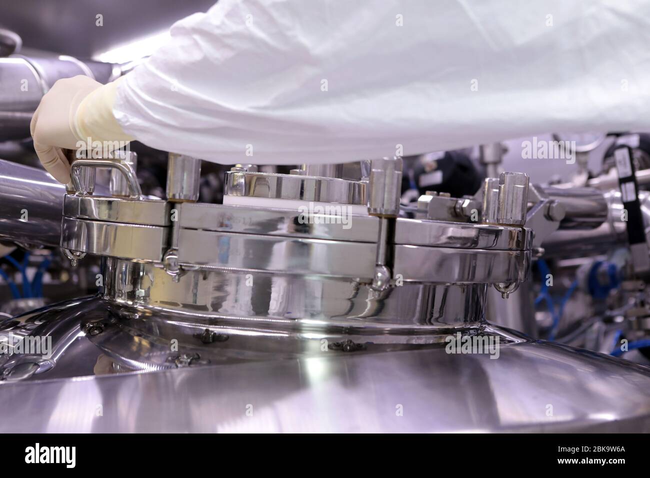 A huge rector for the production of medicine. The man closes the ...