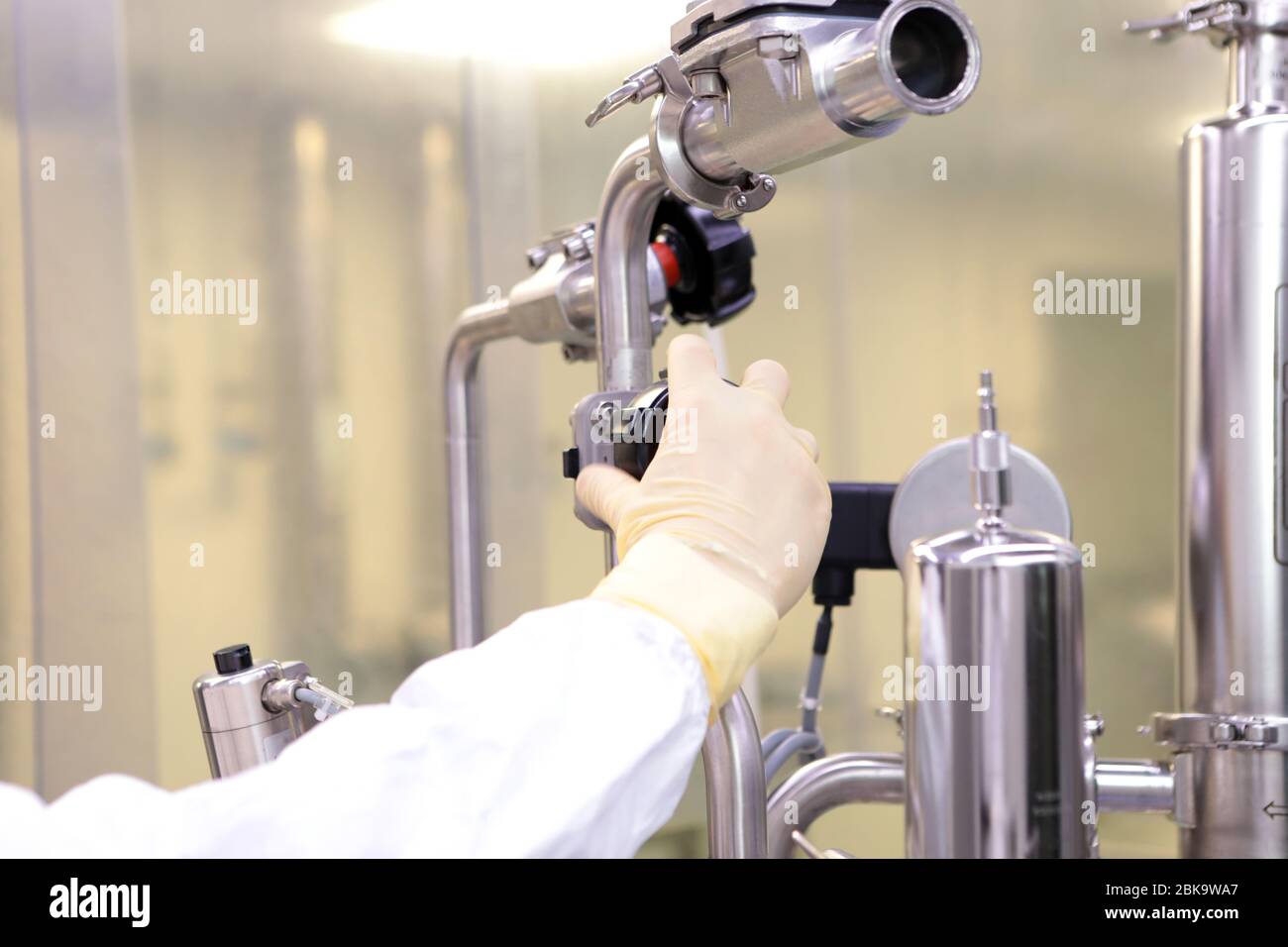 A huge rector for the production of medicine. The man closes the ...