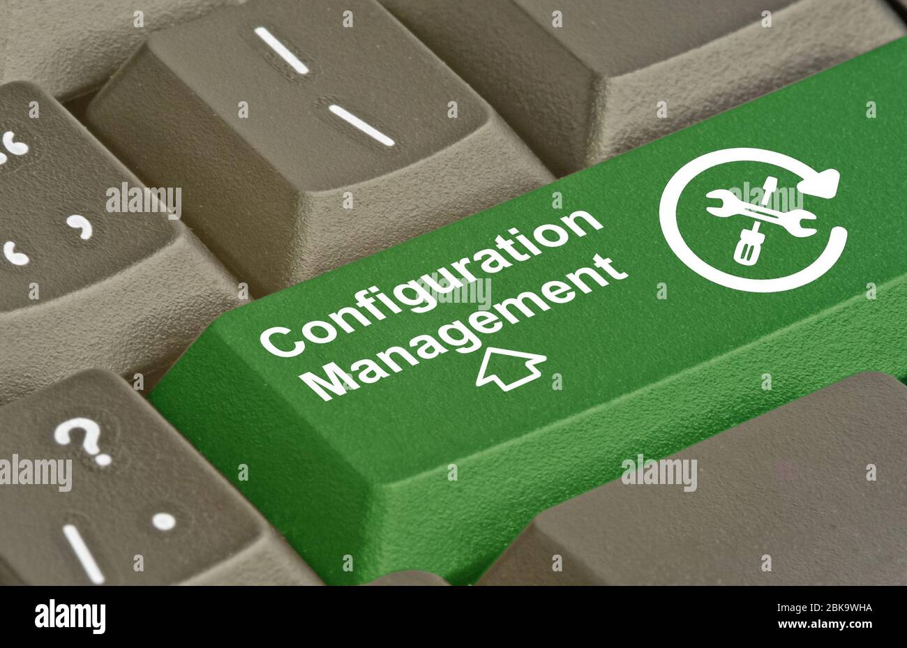 Keyboard with key for configuration management Stock Photo - Alamy