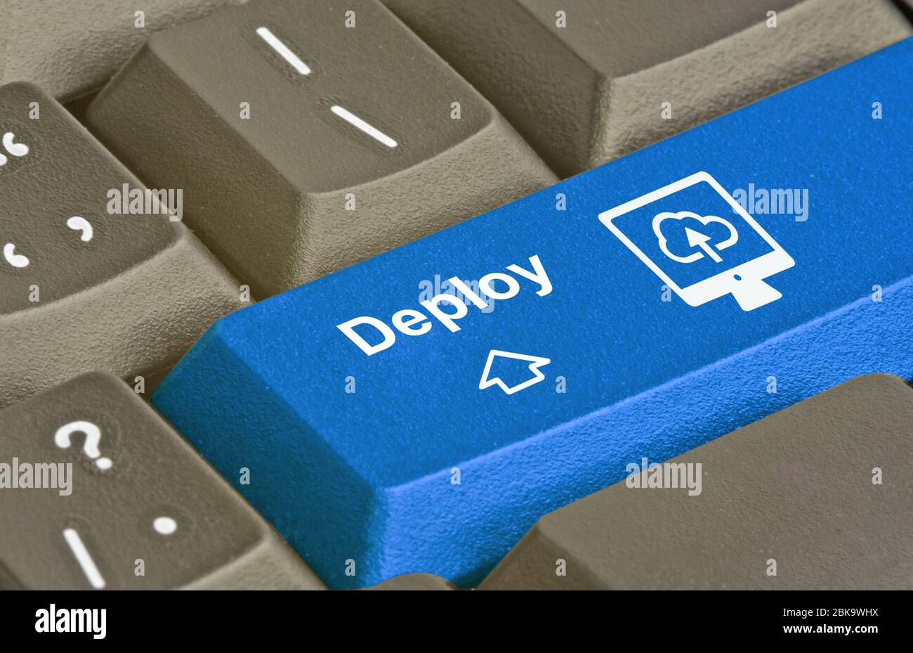Keyboard with key to deploy Stock Photo - Alamy