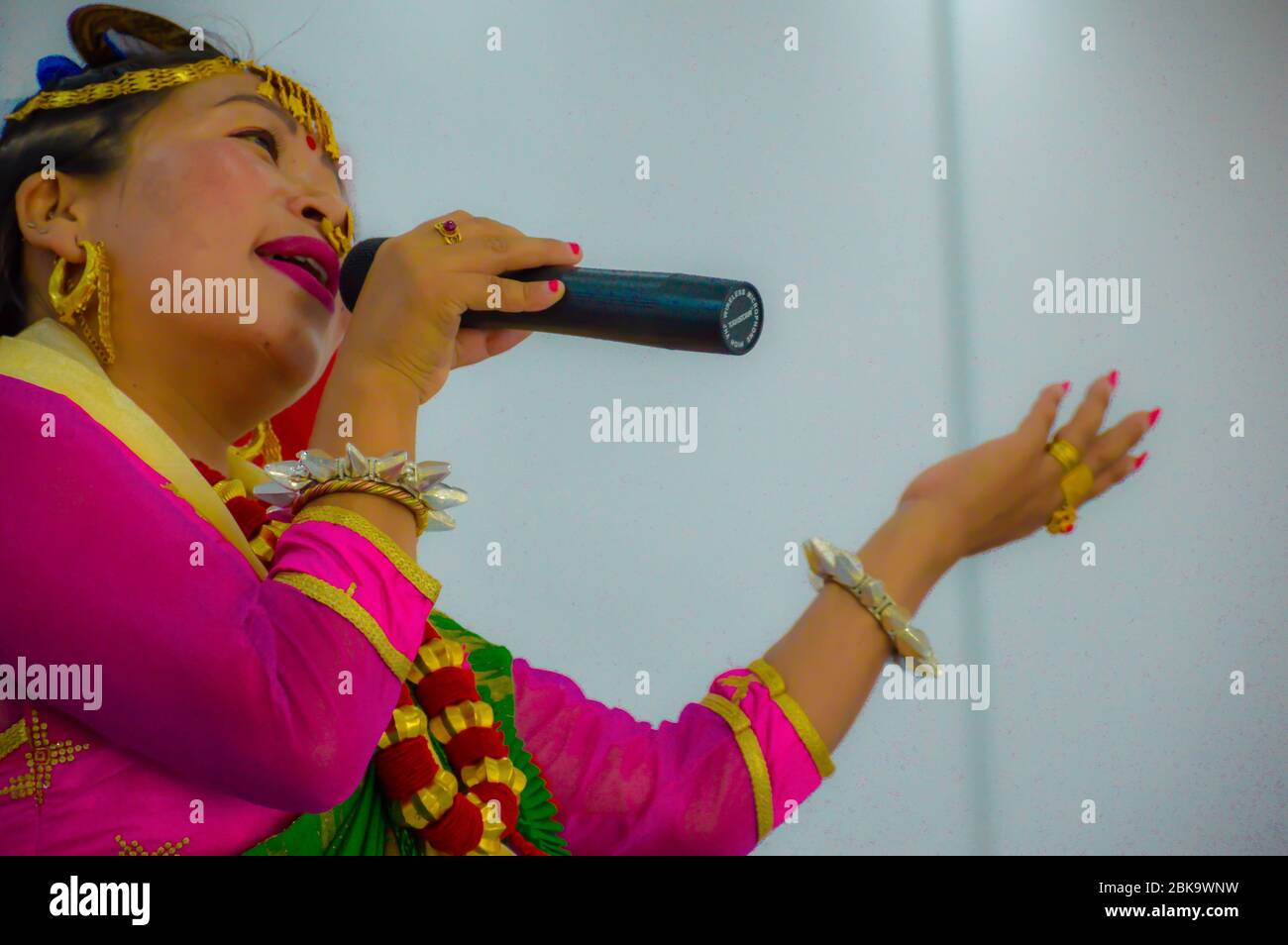 A Nepal singer singing in stage Stock Photo - Alamy