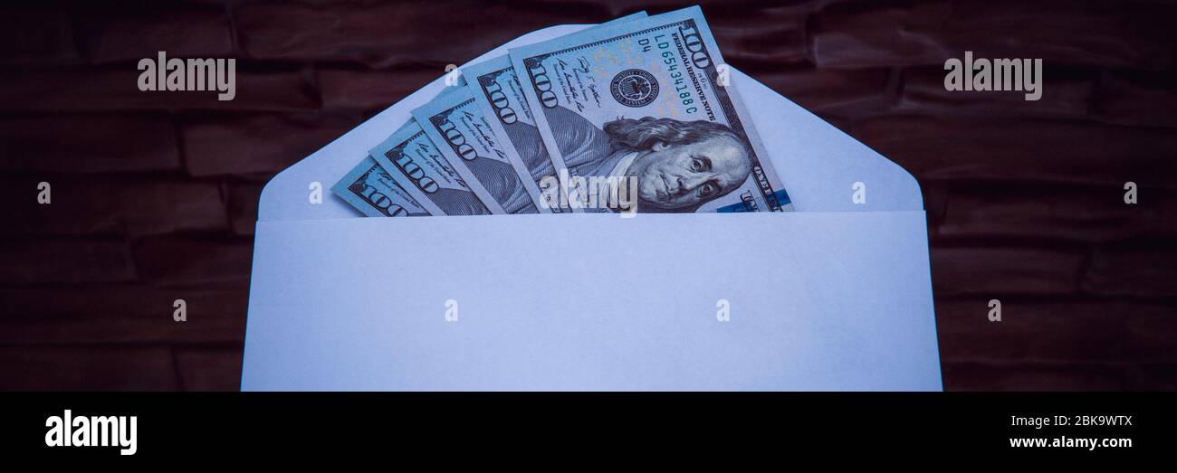 Cash In Brown Envelope High Resolution Stock Photography and Images - Alamy
