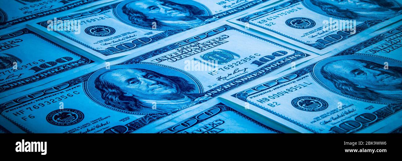 The background of a one hundred dollar bill. Style blue light Stock ...
