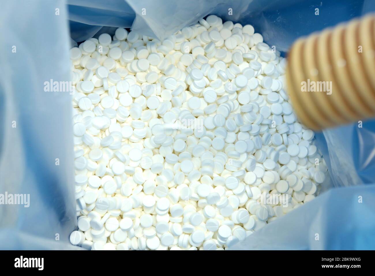Production of tablets. Tablets poured into sterile packaging. Many ...