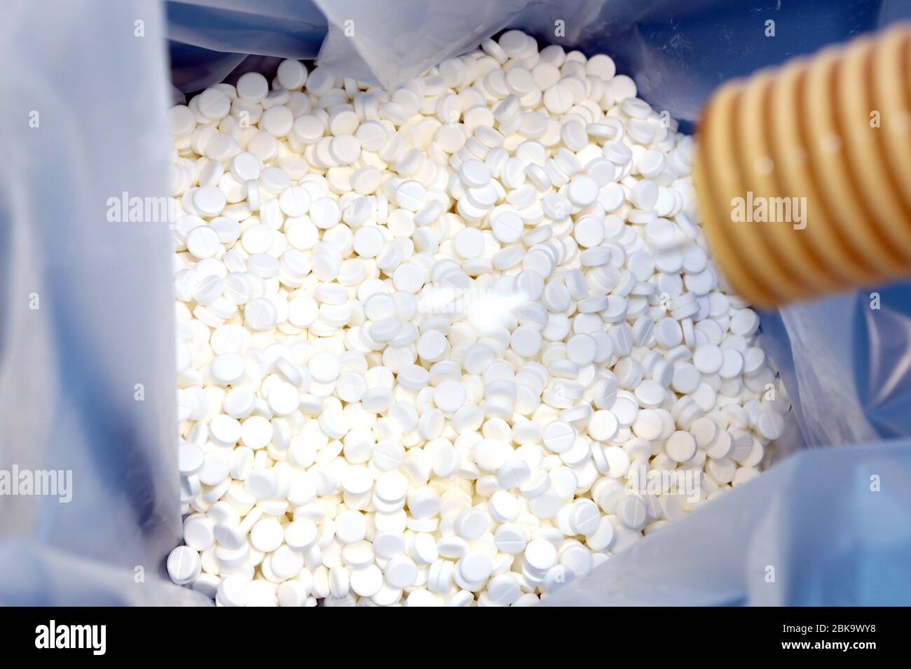Production of tablets. Tablets poured into sterile packaging. Many ...