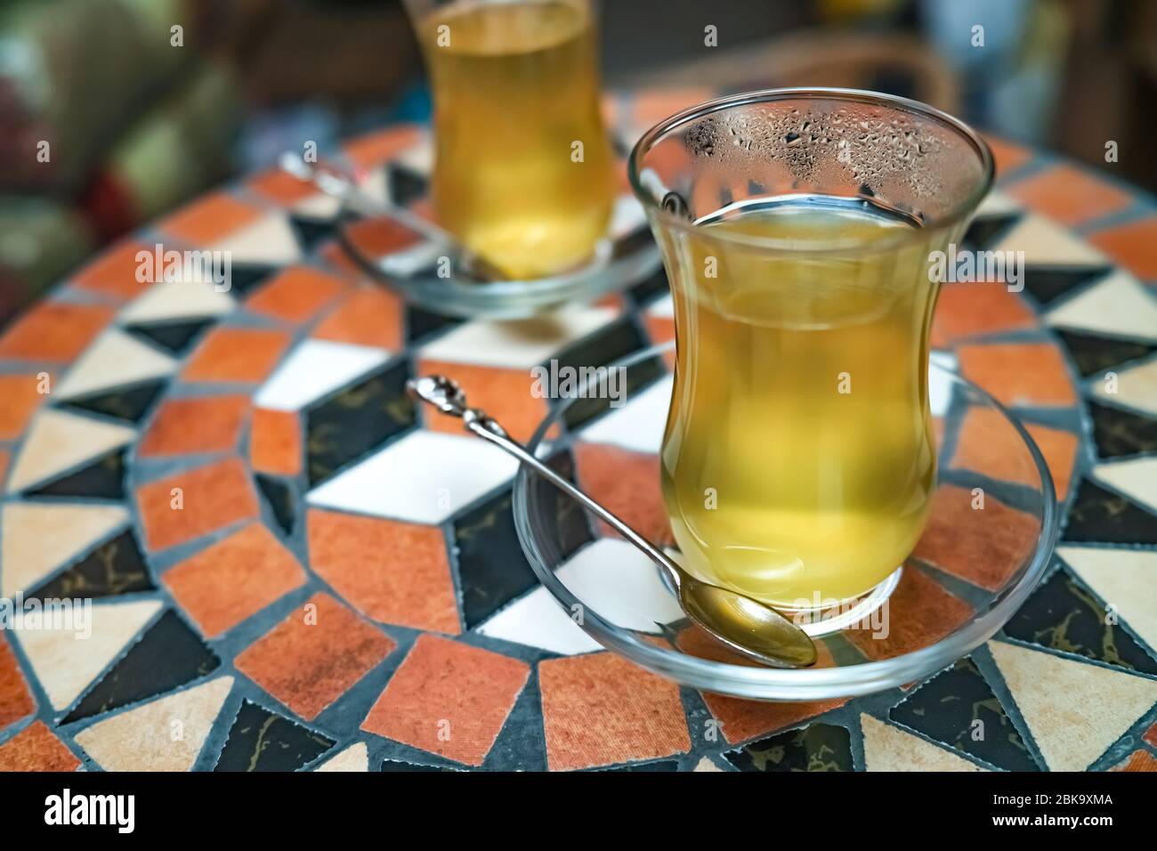 13 Traditional Turkish fruit tea served in glass cups and saucers on a ...