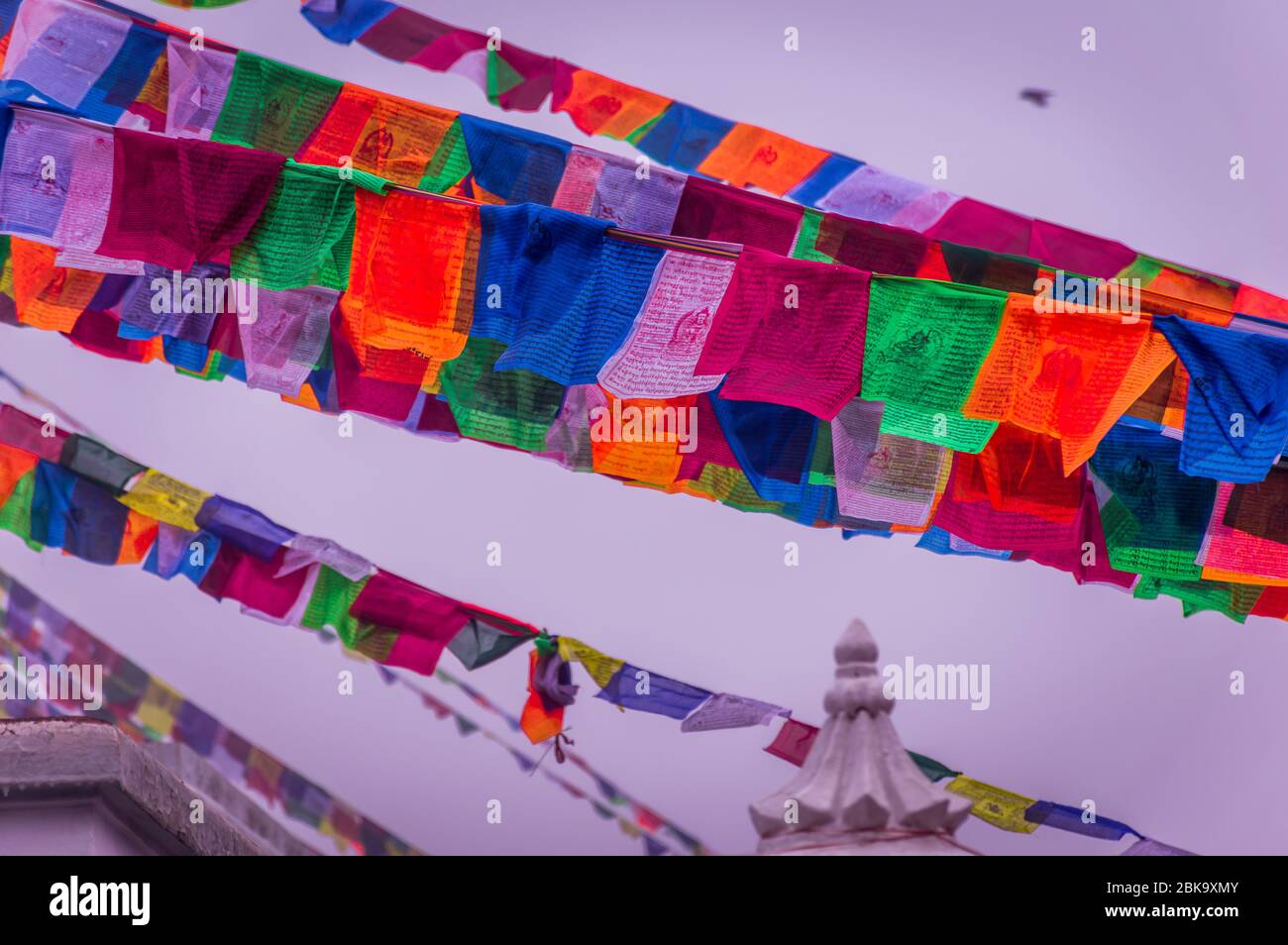 Buddha monastery, colorful flags and monsters Stock Photo - Alamy