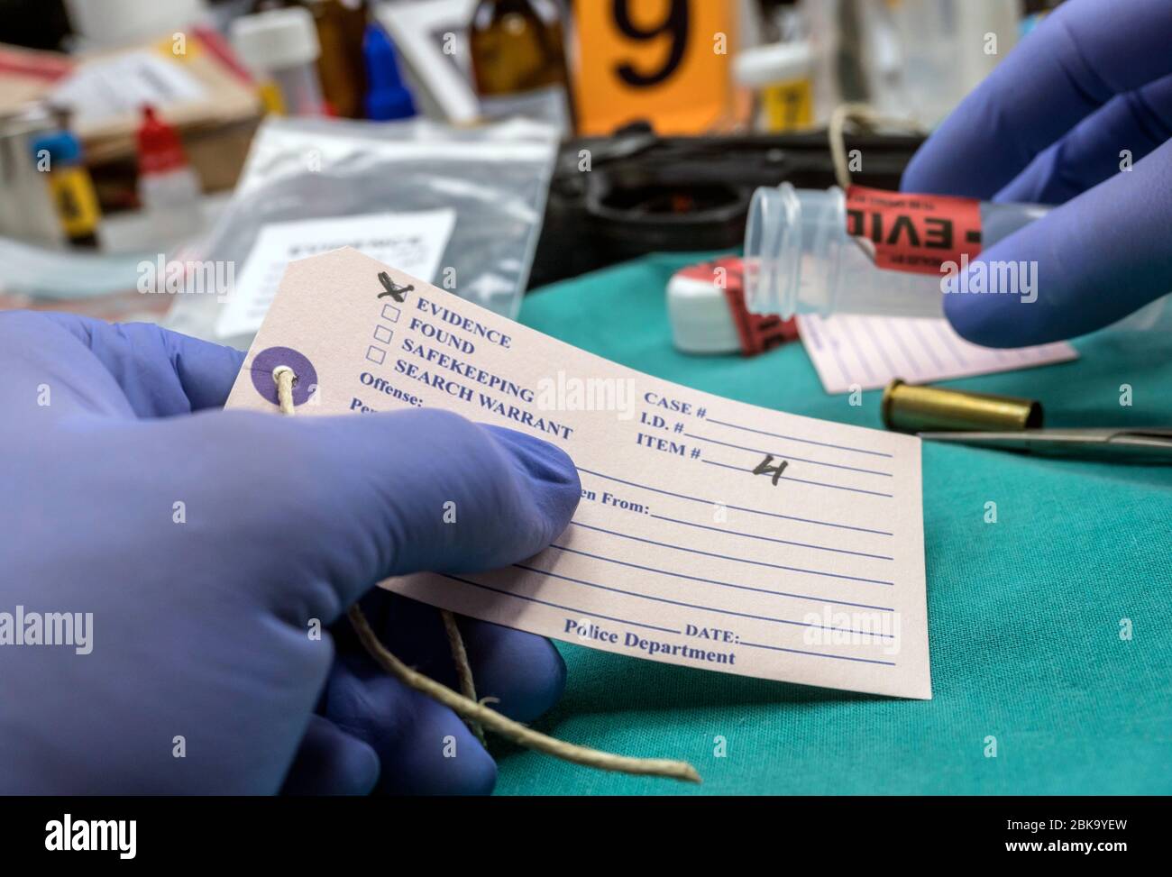 Police expert writes about label evidence number, Various laboratory ...