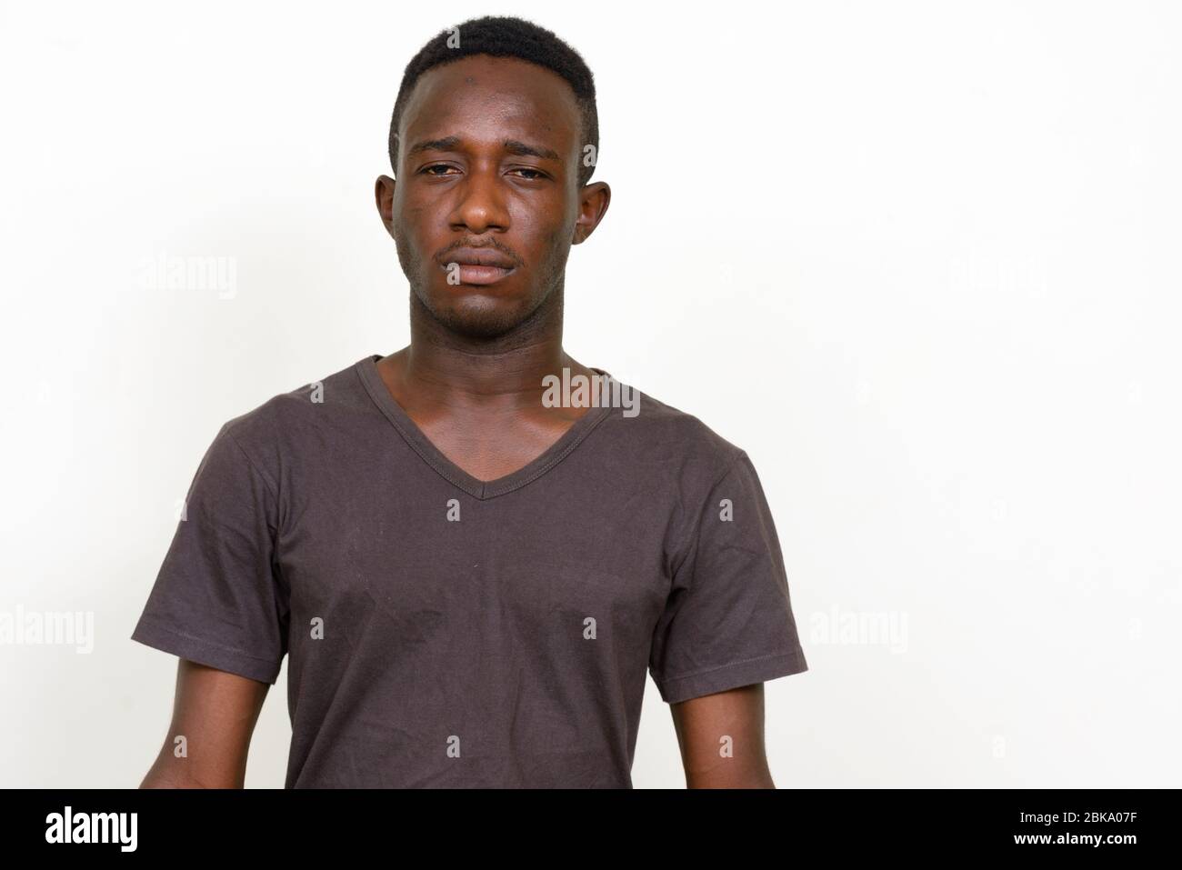 Portrait of stressed young African man looking angry Stock Photo - Alamy