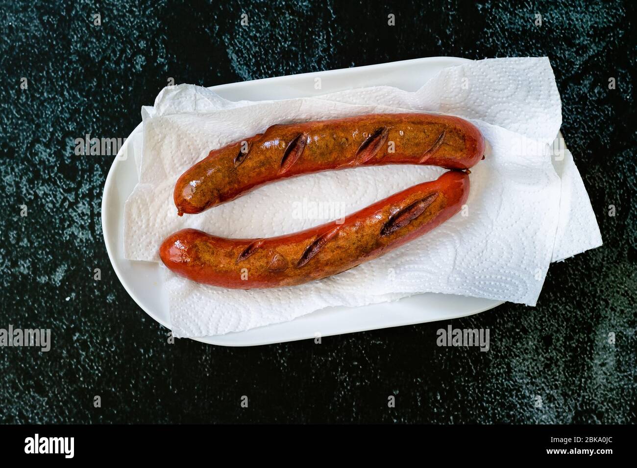 Homemade Bratwurst Sausage with Paper Towel in Plate. Ready to Serve ...