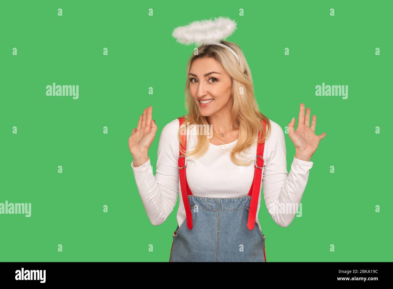 Woman raising hands above head hi-res stock photography and images - Alamy