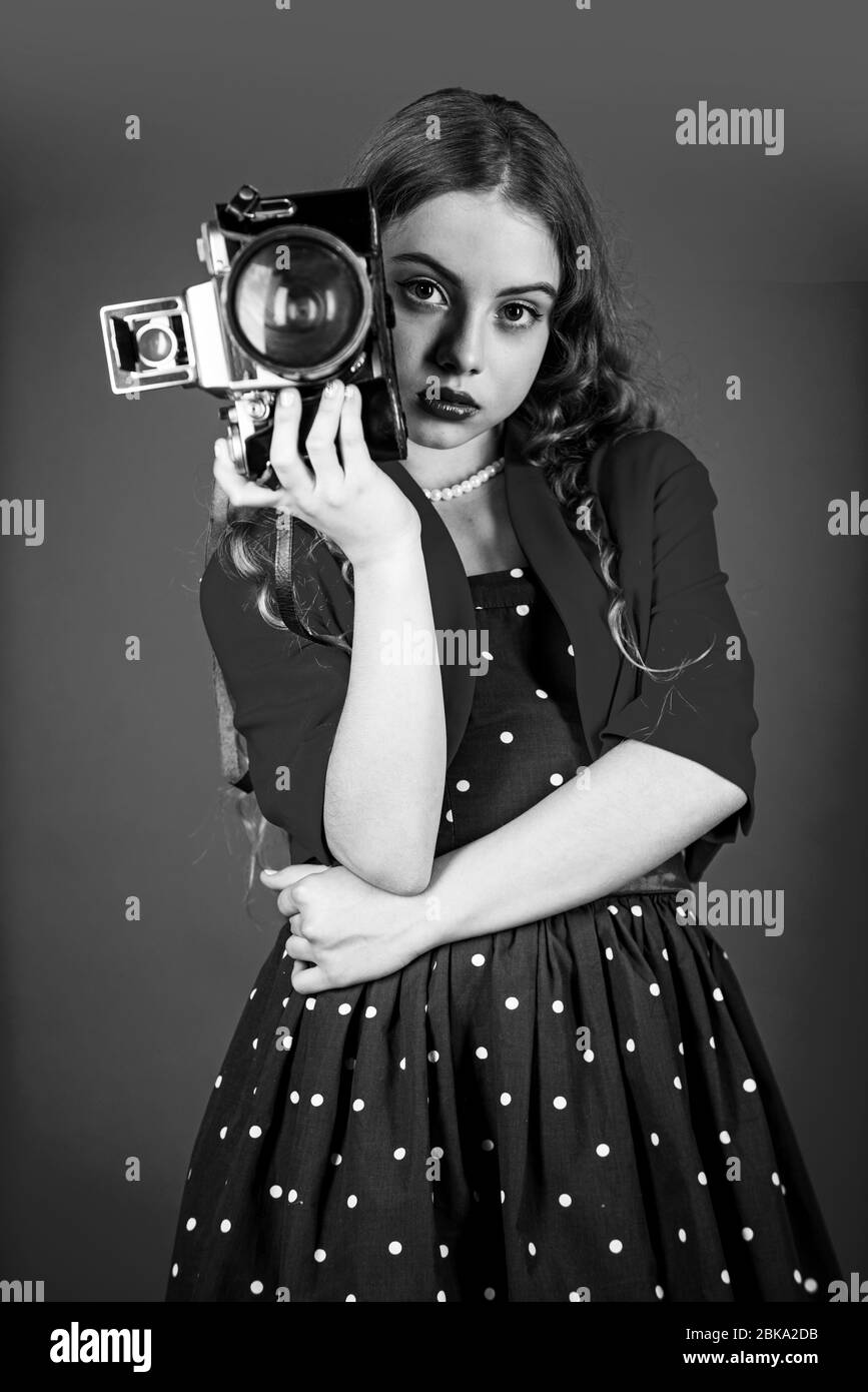 Professional camera. Girl with retro camera. Capture moments. SLR ...