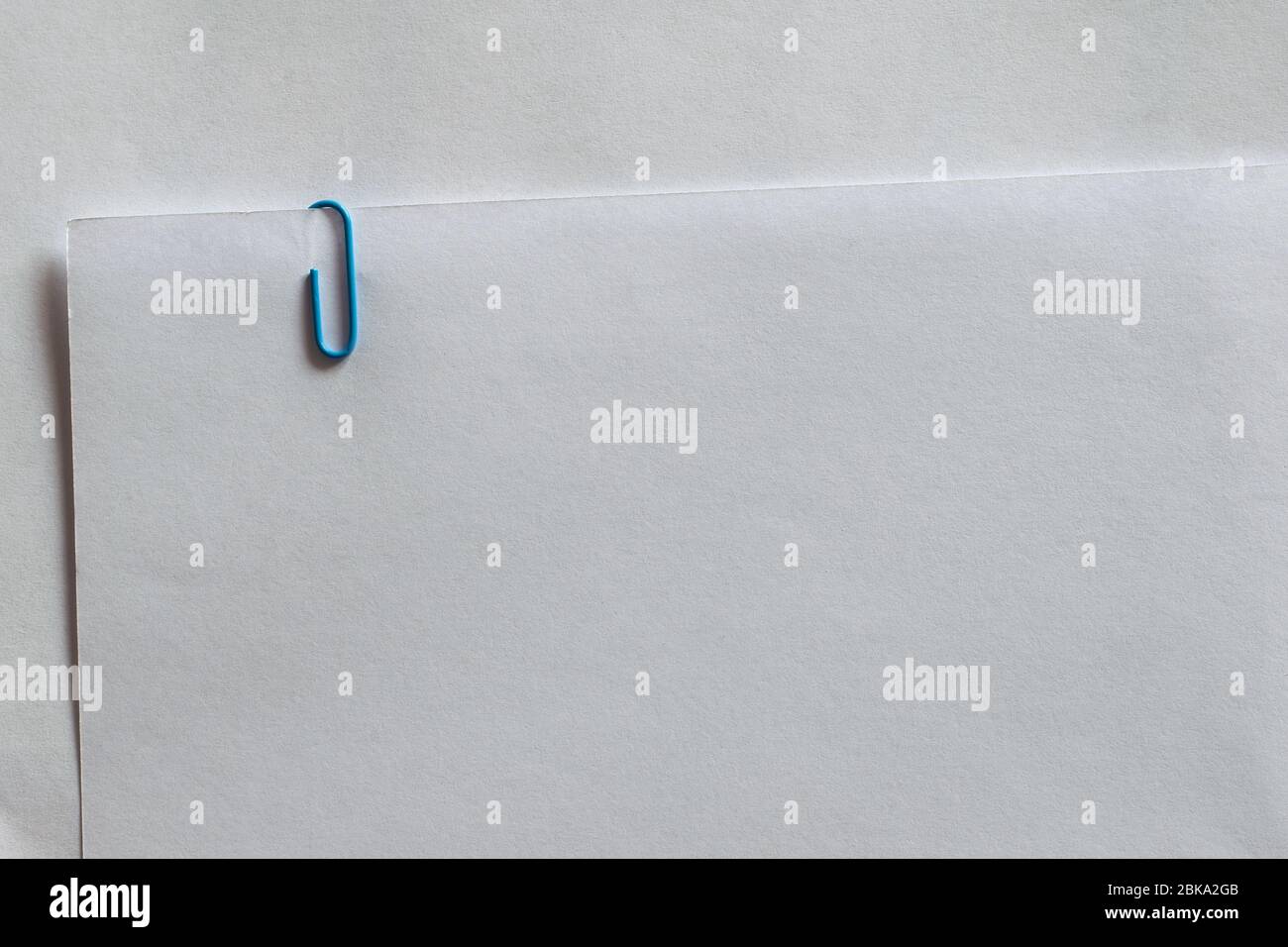 sheet textured paper with a paper clip Stock Photo - Alamy