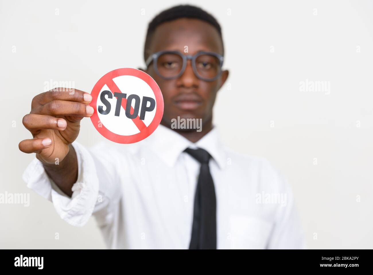 Businessman holding caution sign hi-res stock photography and images ...