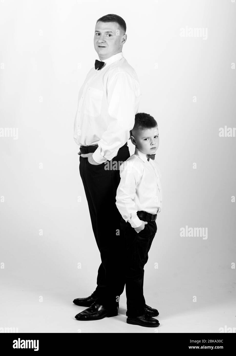 Grow up gentleman. Dad and boy white shirts with bow ties. Gentleman ...