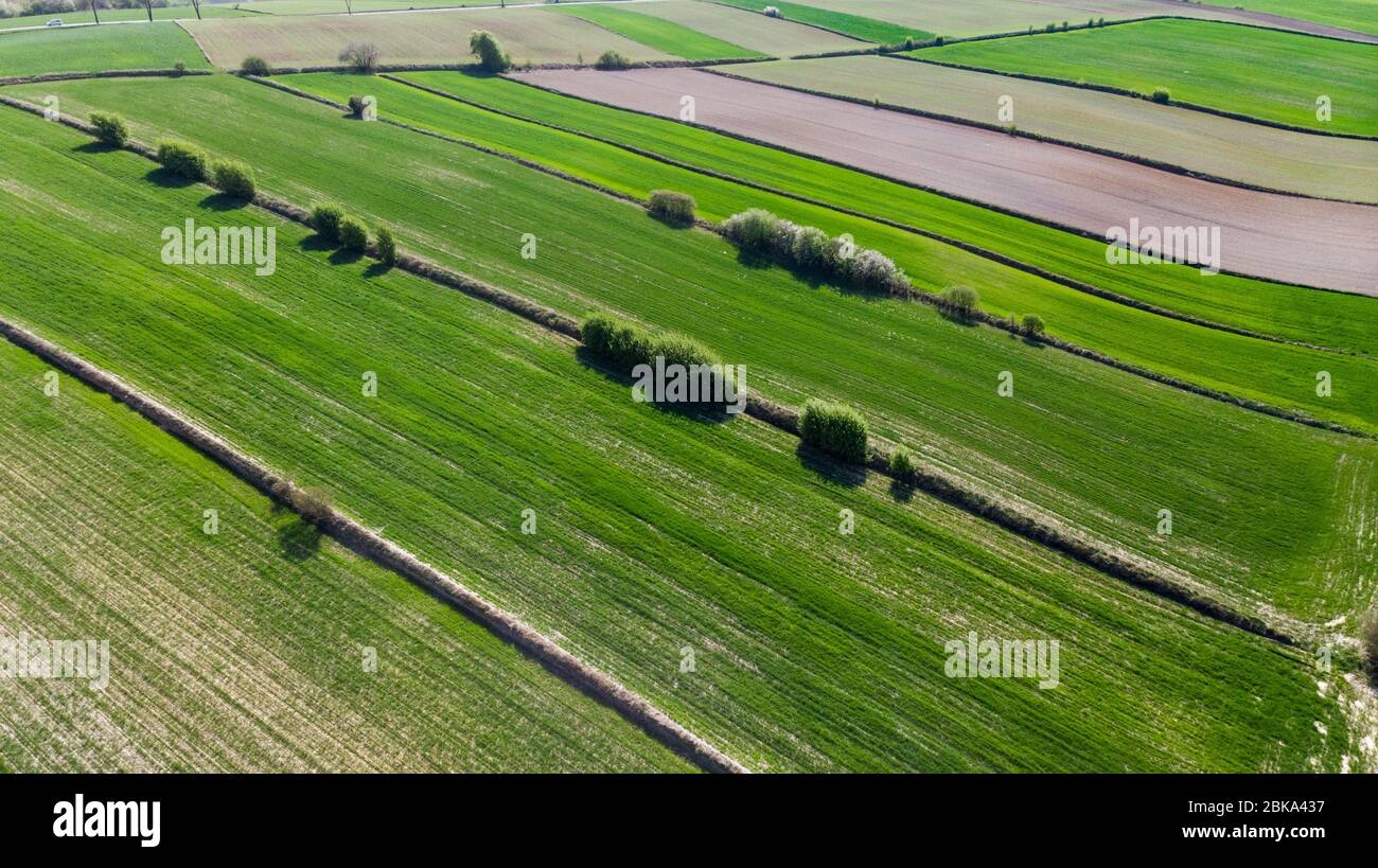 Scenic aerial farmland rows tractor hi-res stock photography and images ...