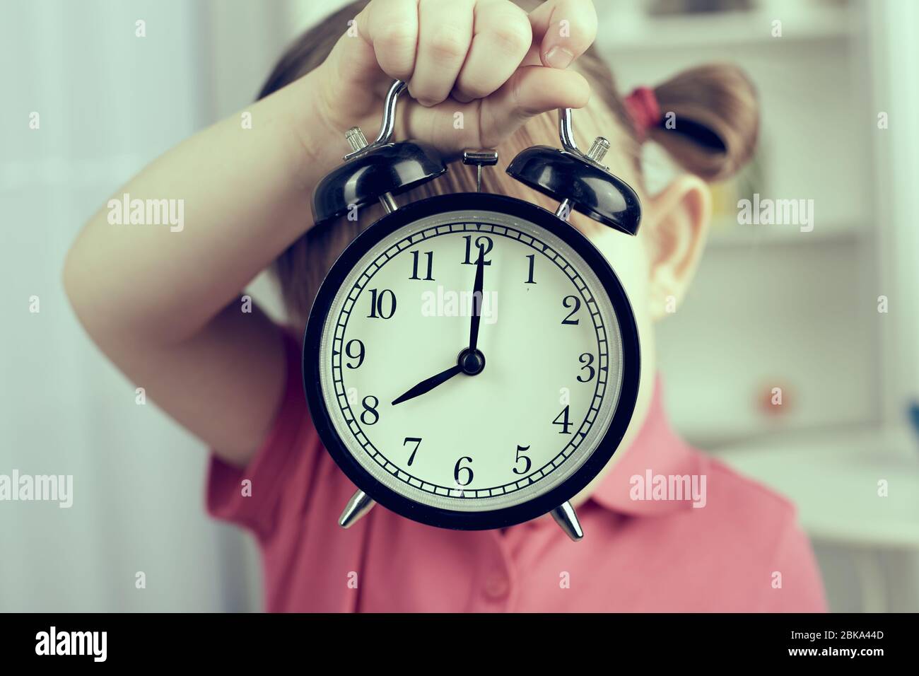 Girl clock hi-res stock photography and images - Alamy