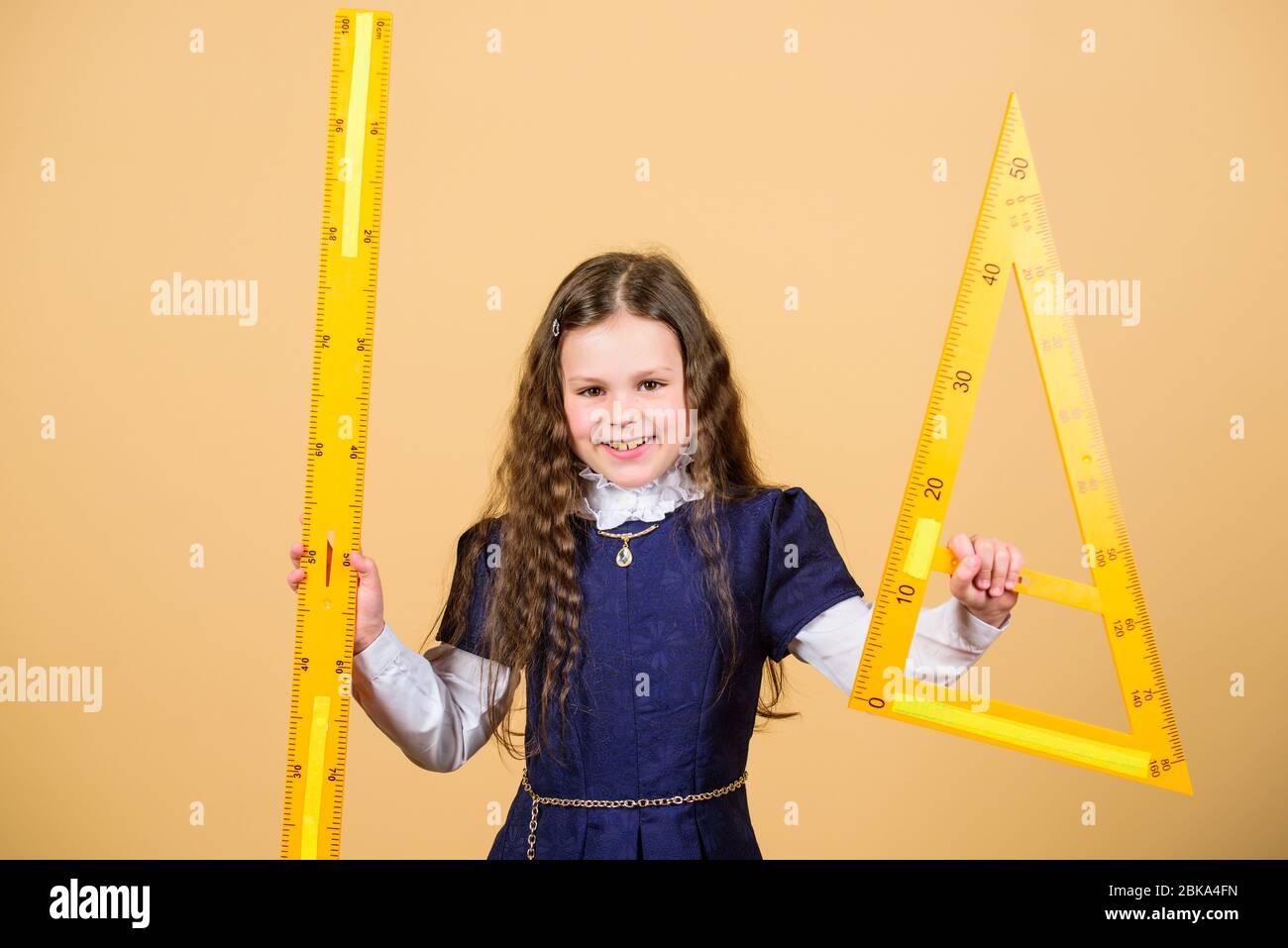 School student study geometry. Kid school uniform hold ruler. I love ...