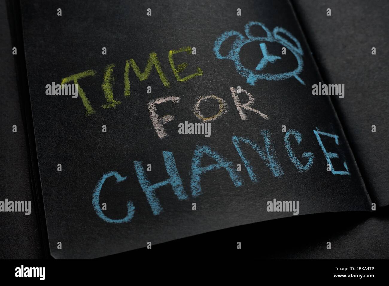 Time for a change. Handwritten concept in a black notebook. Business ...