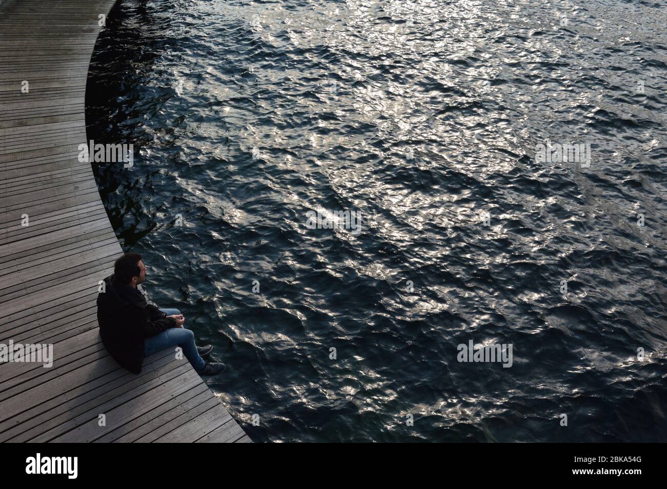 Sitting on edge of dock hi-res stock photography and images - Alamy