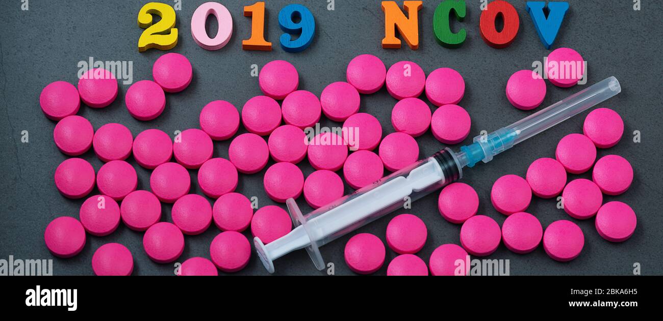 The name of the Chinese flu, its abbreviation. Pink pills and a syringe ...