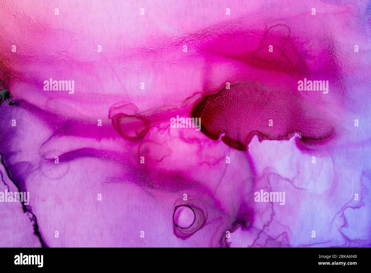 Vivid pink and purple alcohol ink abstract background. Hand painted and ...