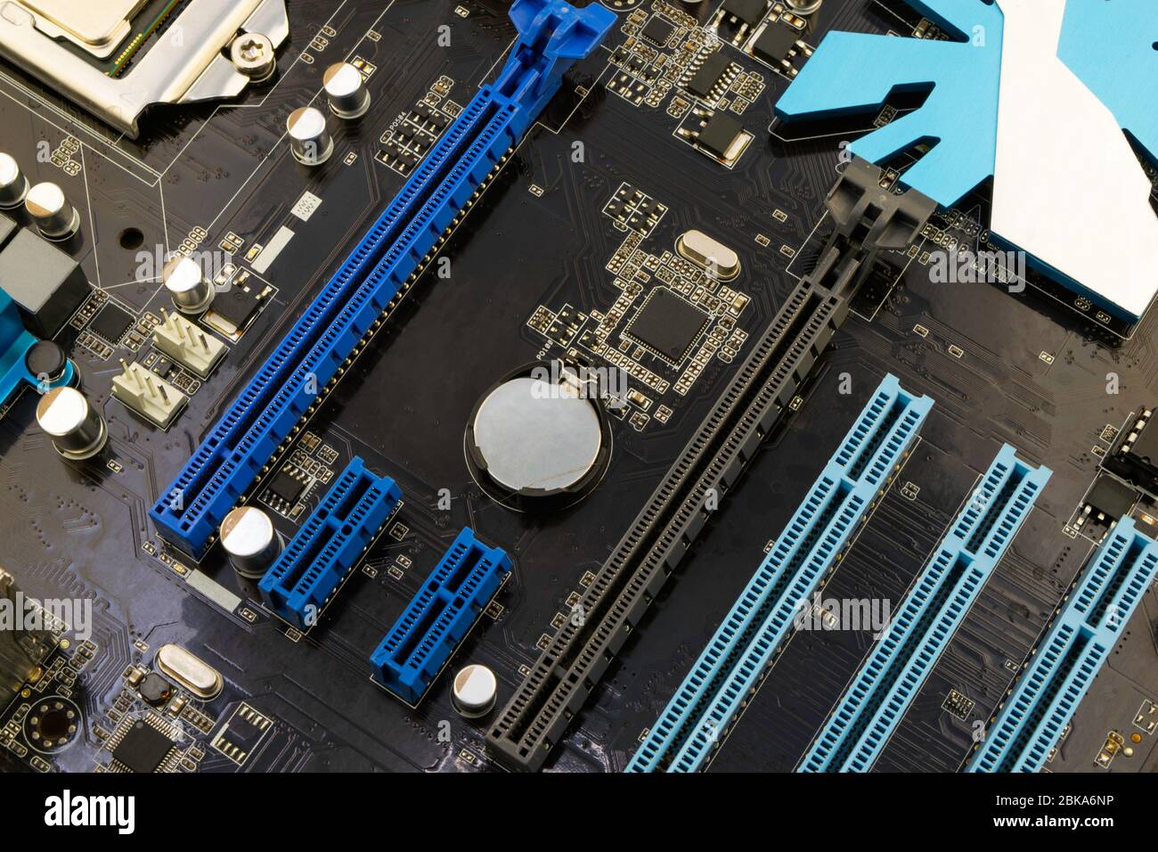 computer motherboard, with processor and other parts installed on it ...