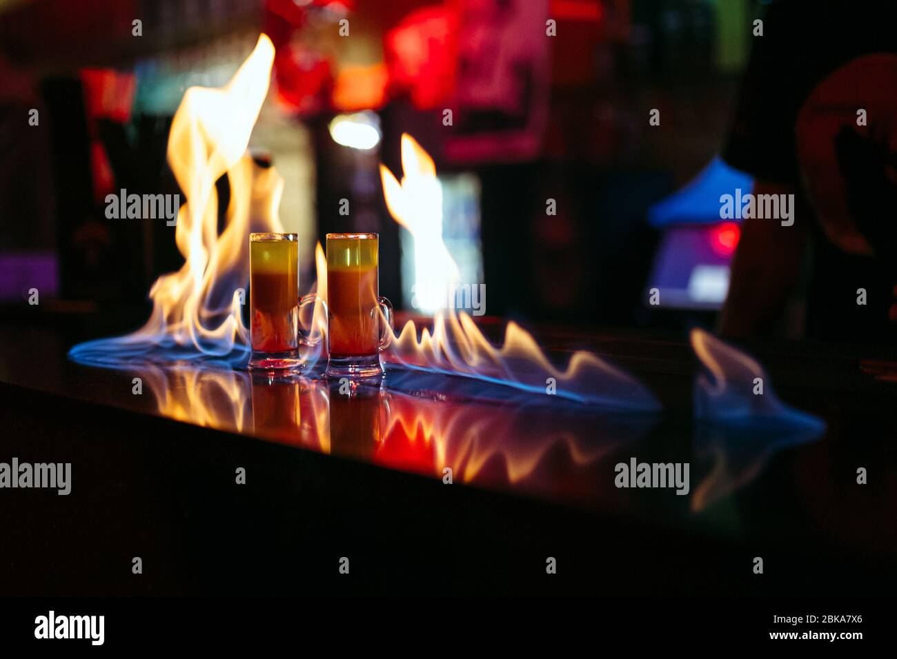 burning cocktails on the bar Stock Photo - Alamy