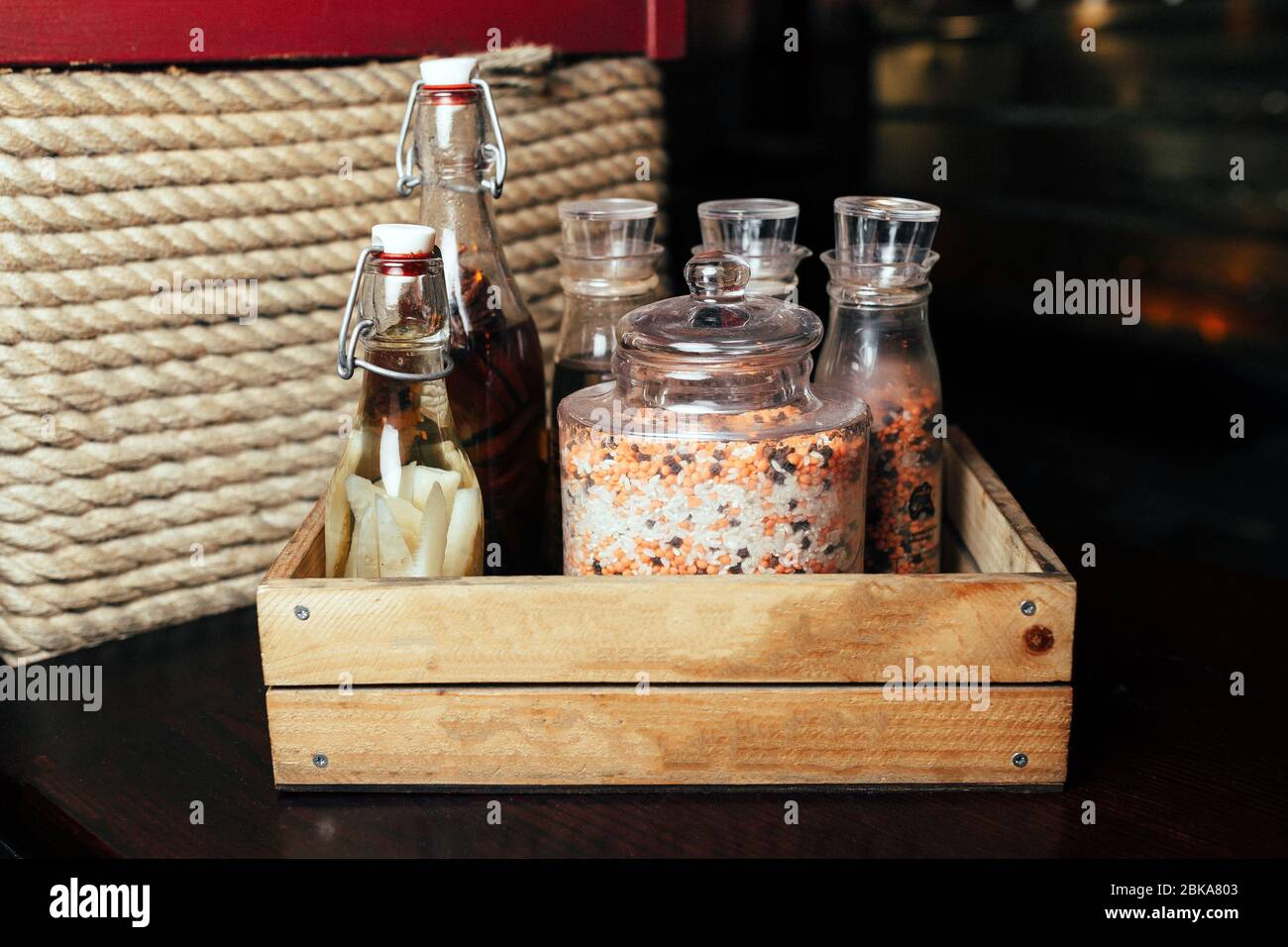 condiments in cans in a box Stock Photo - Alamy