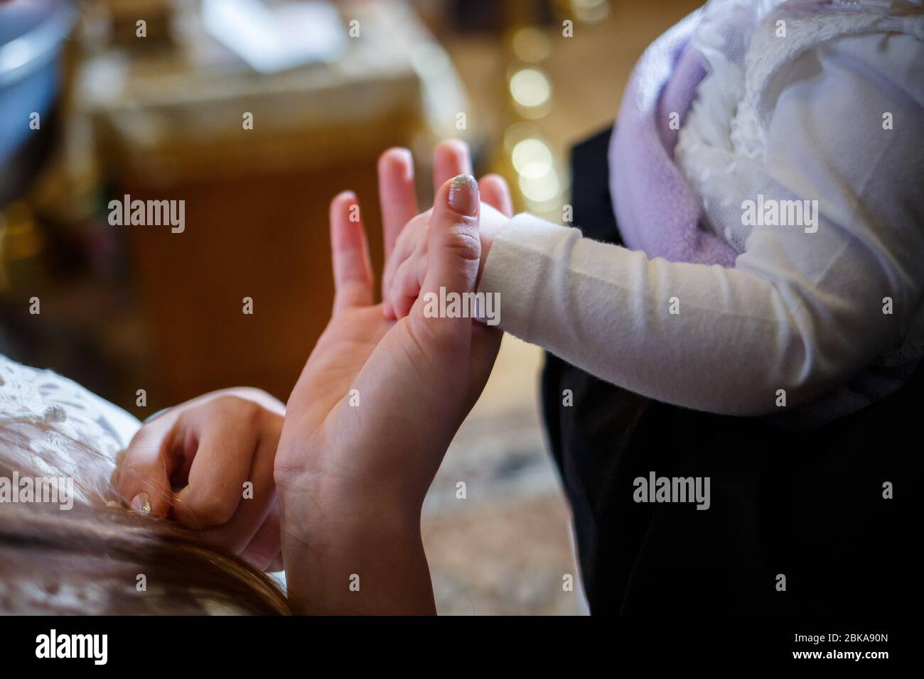 Children hand in mom hand Stock Photo - Alamy