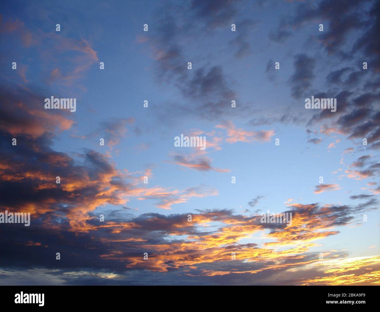 skies in different hours of day with color and clouds Stock Photo - Alamy
