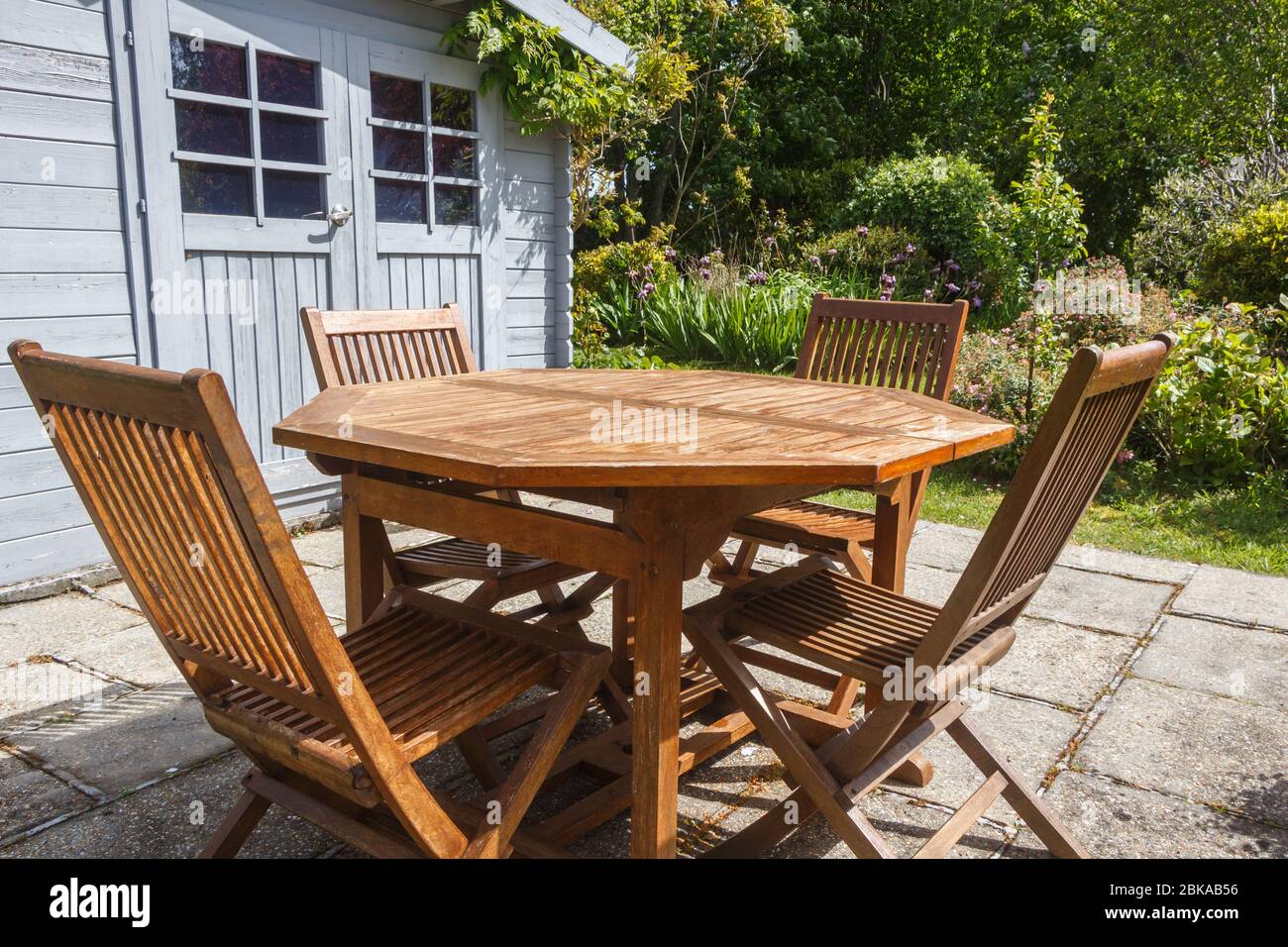 Terrace and wooden garden furniture during spring Stock Photo - Alamy