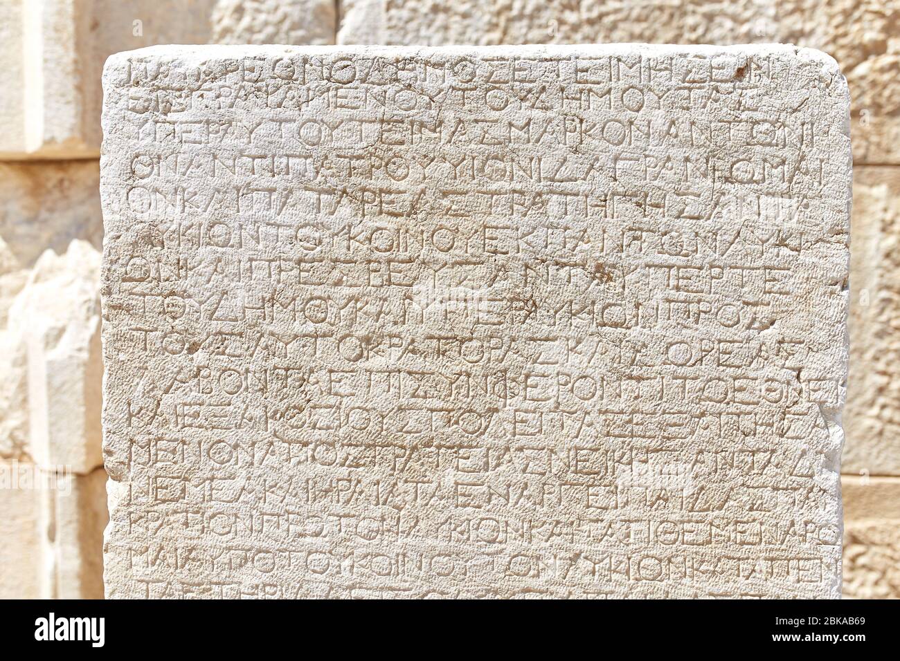 Texture of the ancient text on the stone Stock Photo - Alamy