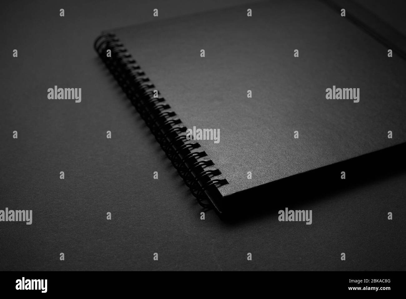 Photo blank closed notebook Black and White Stock Photos & Images - Alamy