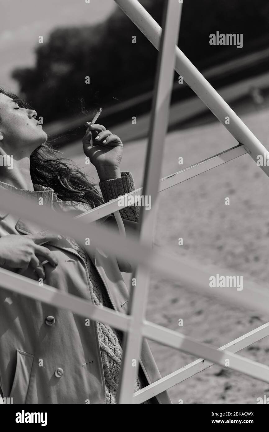 Smiling cigarette girl hi-res stock photography and images - Alamy