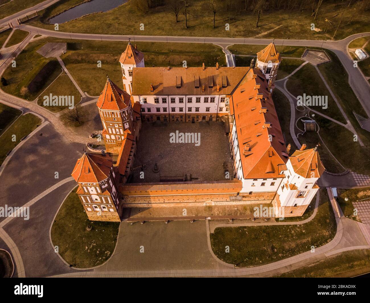Aerial view of Medieval Mir castle complex at spring sunset. Famous ...