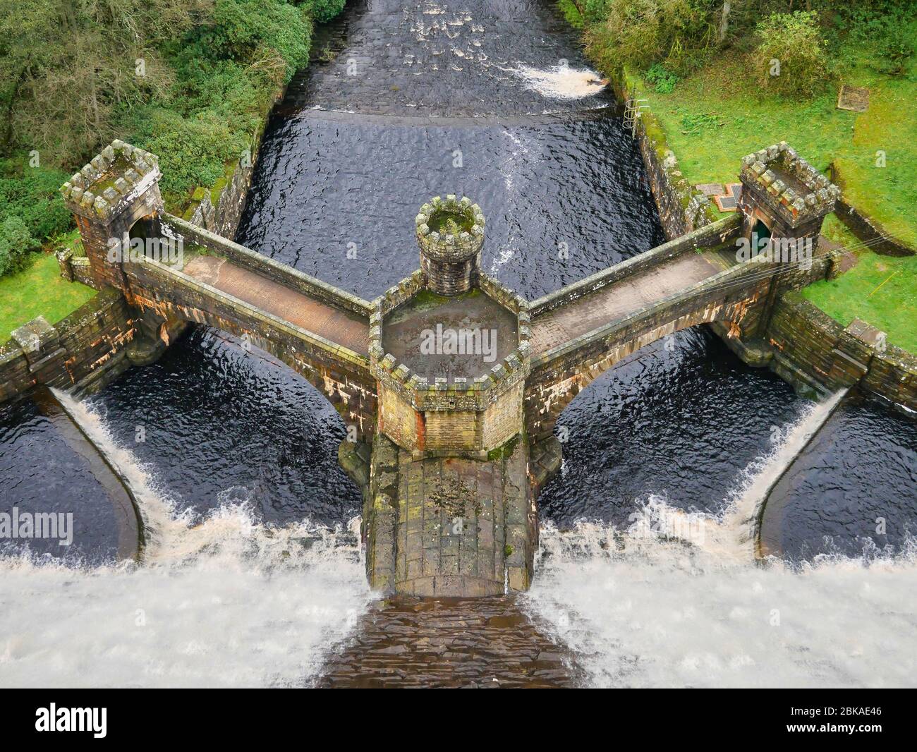 Water of the River Nidd spills over the 71m high stone dam of Scar ...