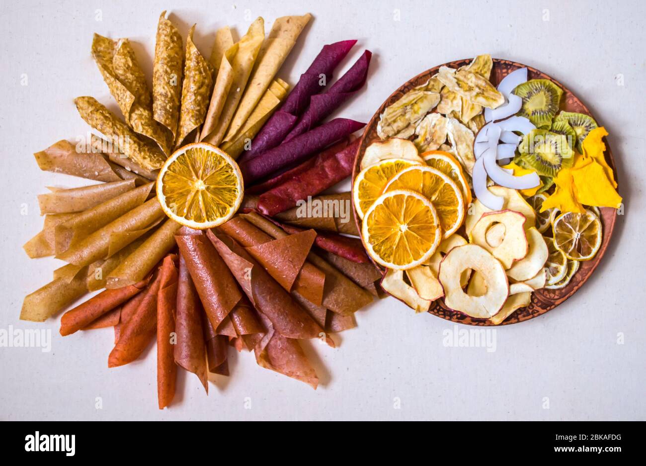 Sweet pure fruit pastille. Natural sweets from dried berries and fruits ...