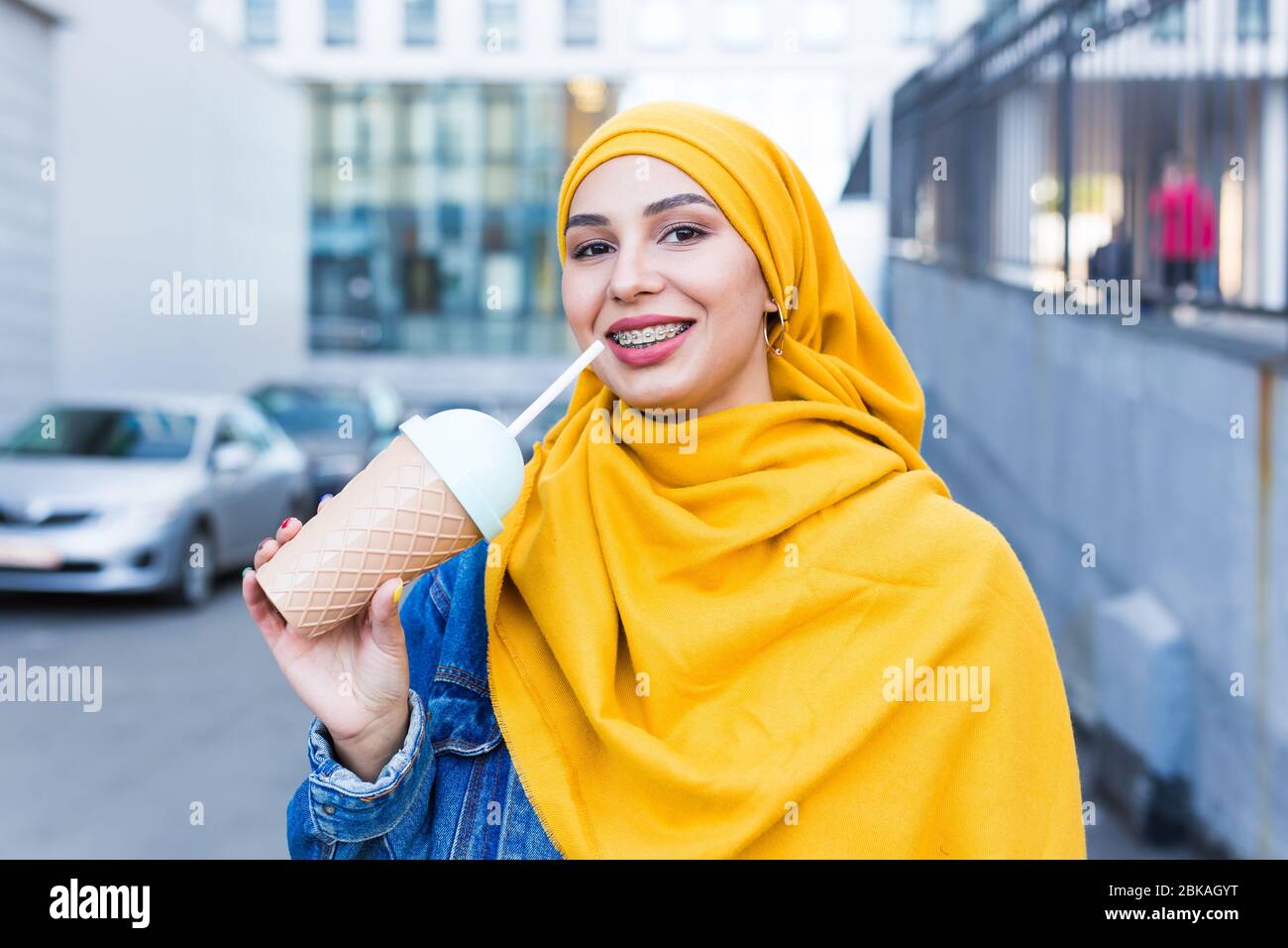 Young arabian muslim woman enjoying cocktail outdoor Stock Photo - Alamy