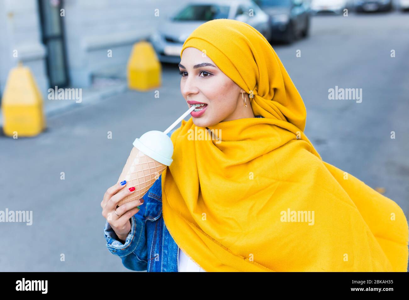 Young arabian muslim woman enjoying cocktail outdoor Stock Photo - Alamy