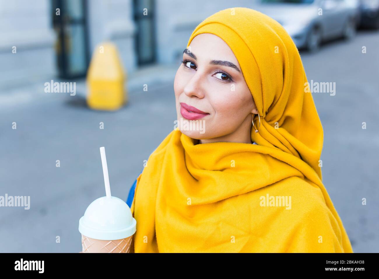 Young arabian muslim woman enjoying cocktail outdoor Stock Photo - Alamy
