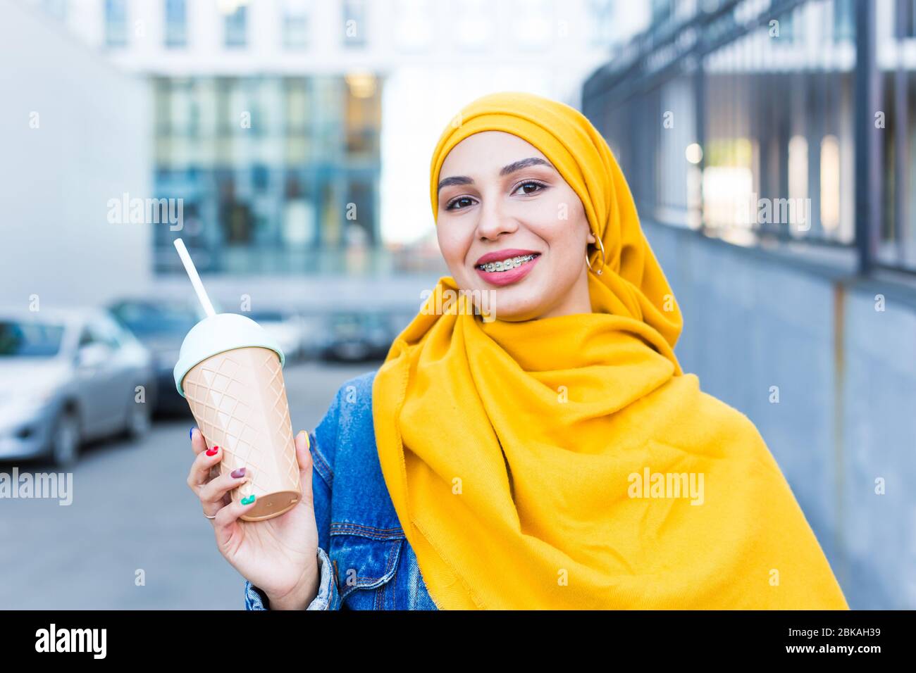 Young arabian muslim woman enjoying cocktail outdoor Stock Photo - Alamy