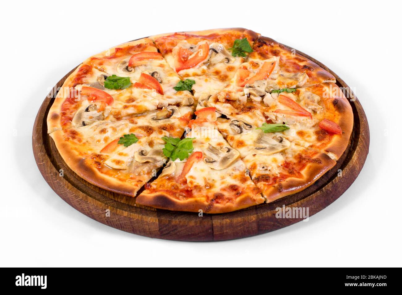 Pizza on a wood plate on a white background Stock Photo - Alamy
