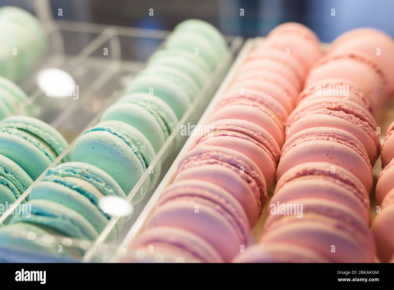 Fresh colored macaroons close-up, sale in coffee shop showcase Stock ...