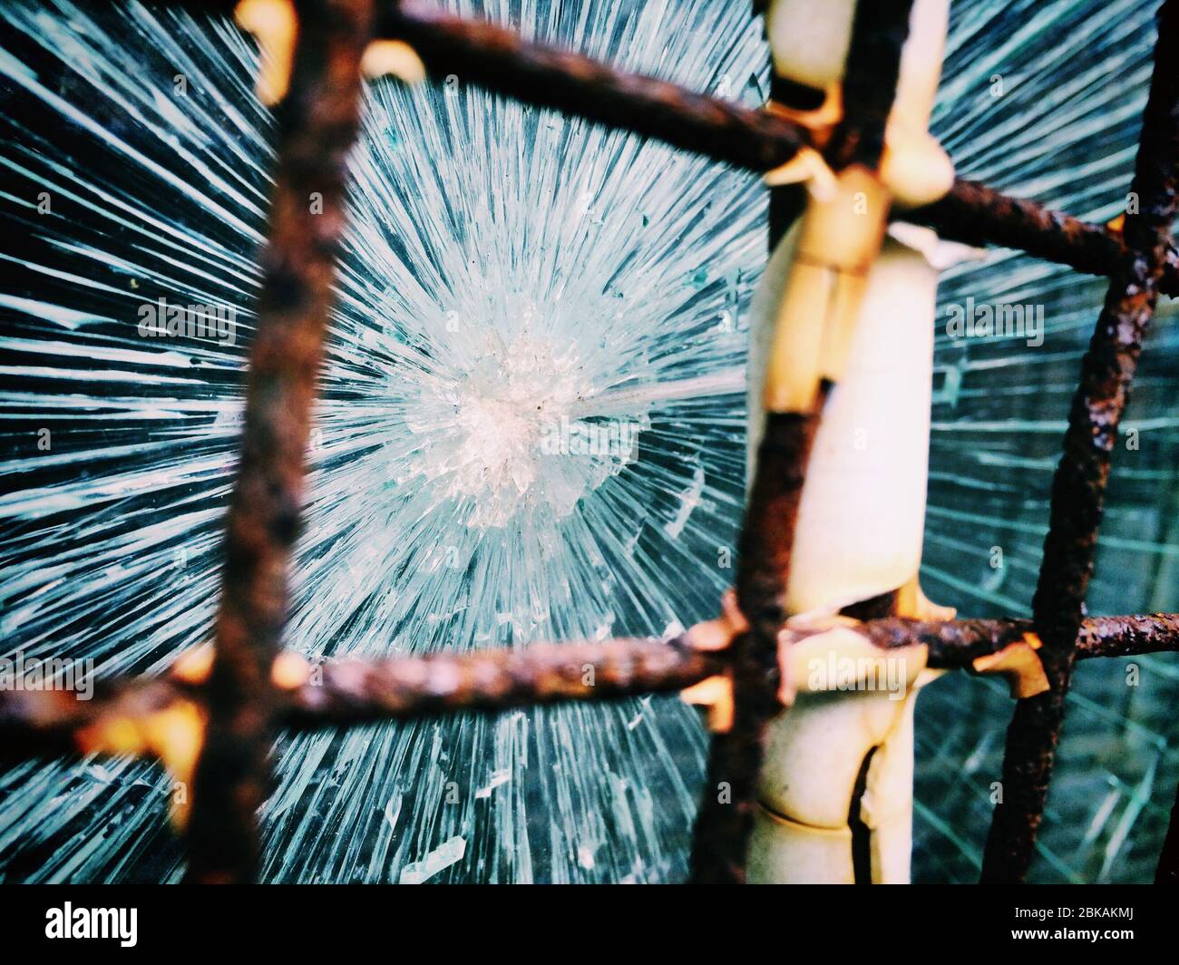Smashed window detail in Ancoats, Manchester Stock Photo - Alamy